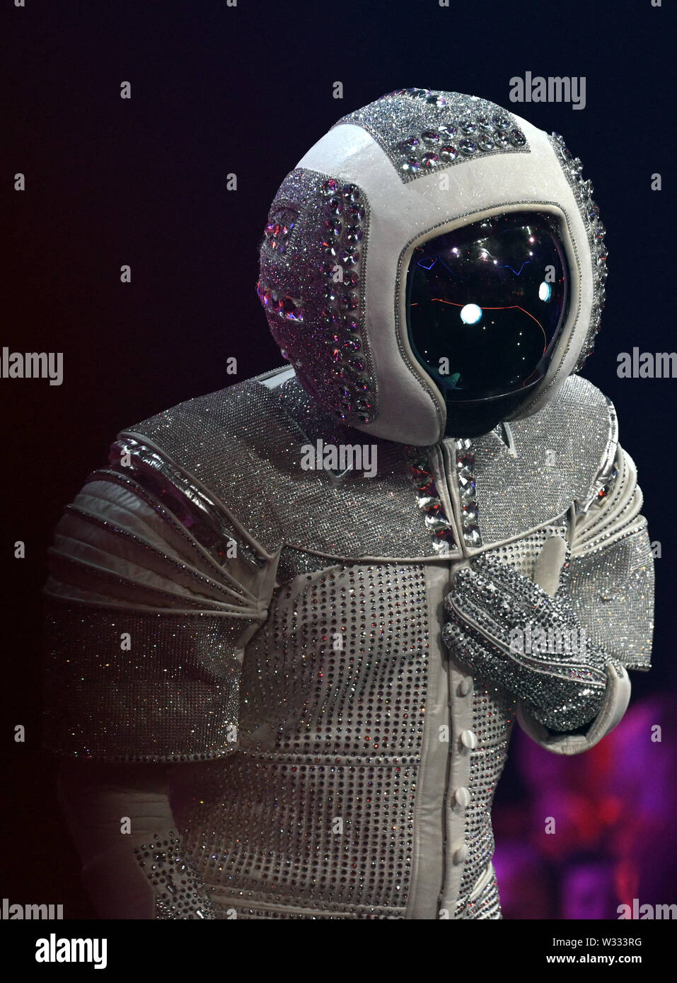 The masked singer astronaut hi-res stock photography and images - Alamy