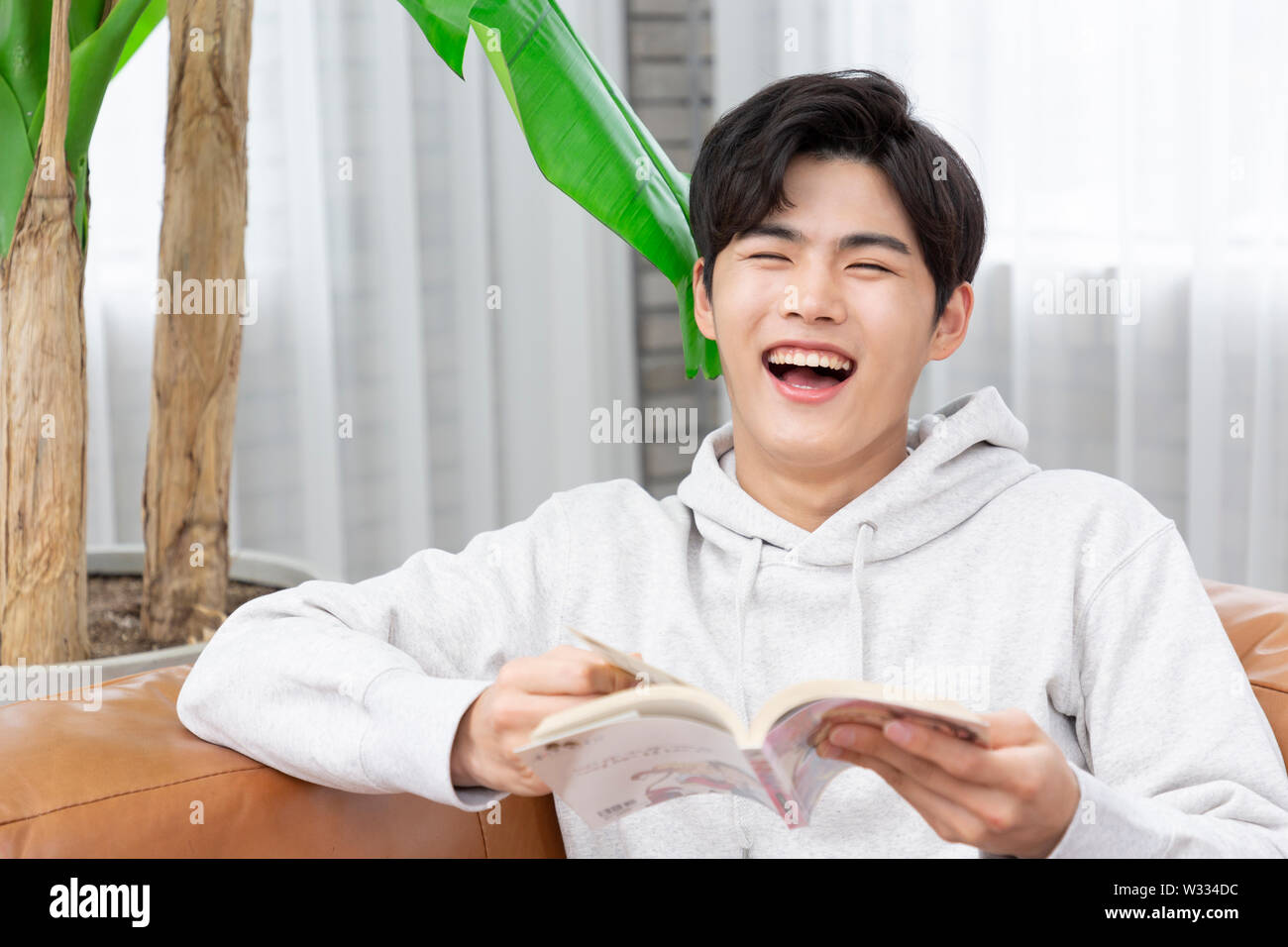 Daily routines Of an asian young man 048 Stock Photo - Alamy