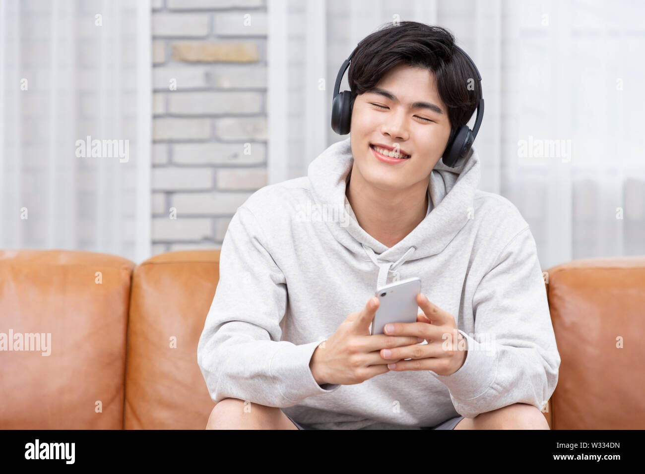 Daily routines Of an asian young man 045 Stock Photo - Alamy