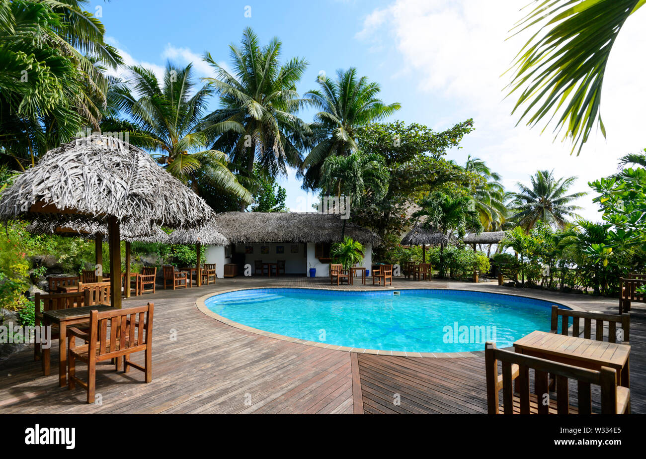 Swimming pool and thatch roof umbrellas at the luxury resort of Etu ...