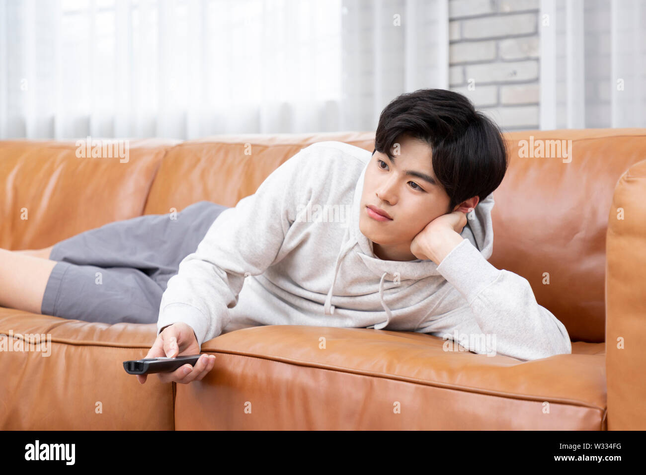 Daily routines Of an asian young man 036 Stock Photo - Alamy