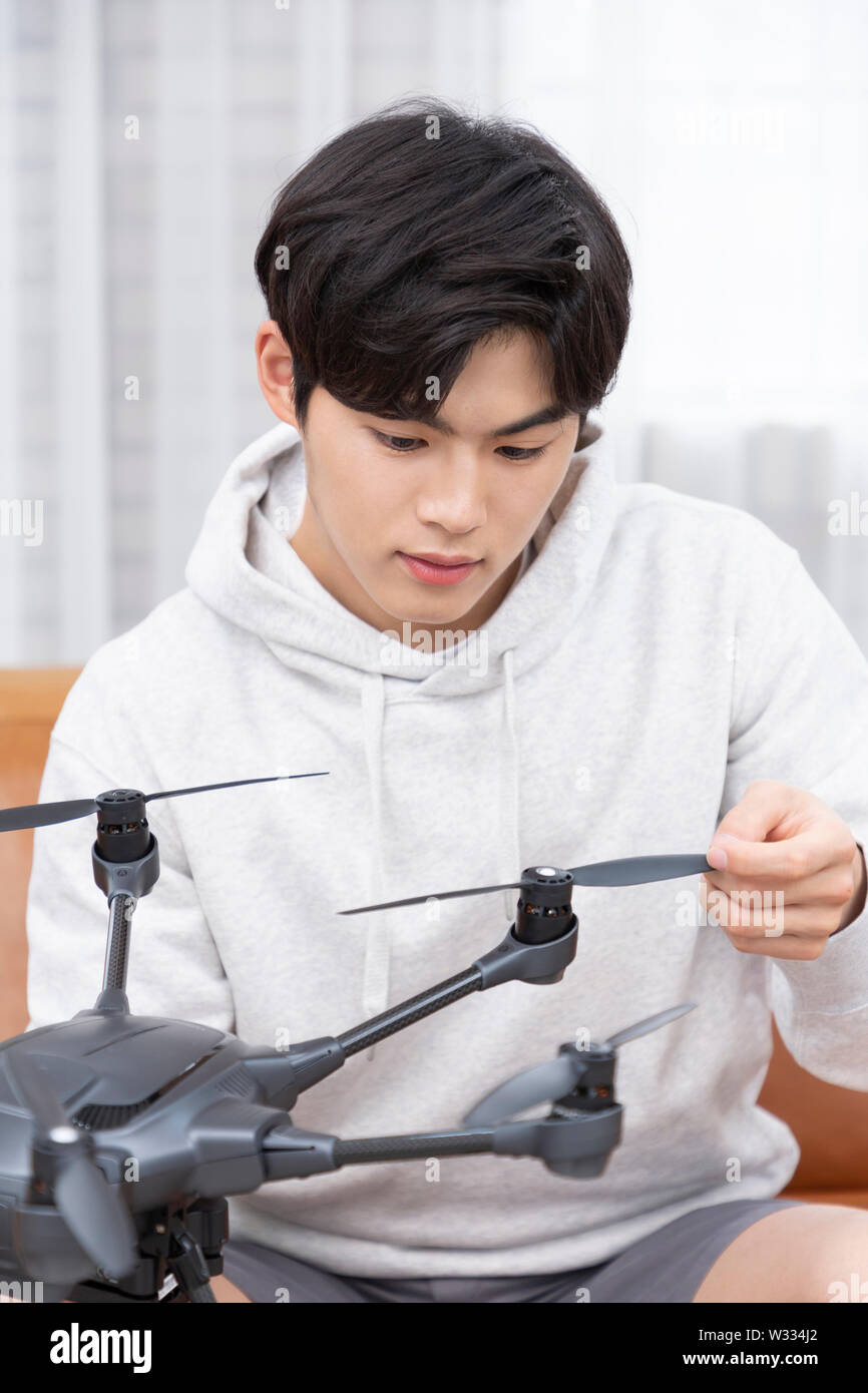 Daily routines Of an asian young man 013 Stock Photo - Alamy