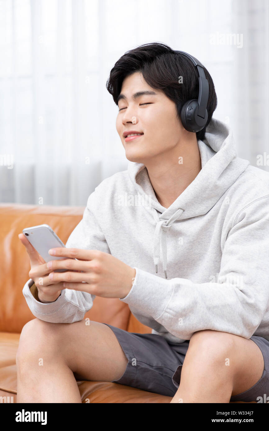 Daily routines Of an asian young man 020 Stock Photo - Alamy