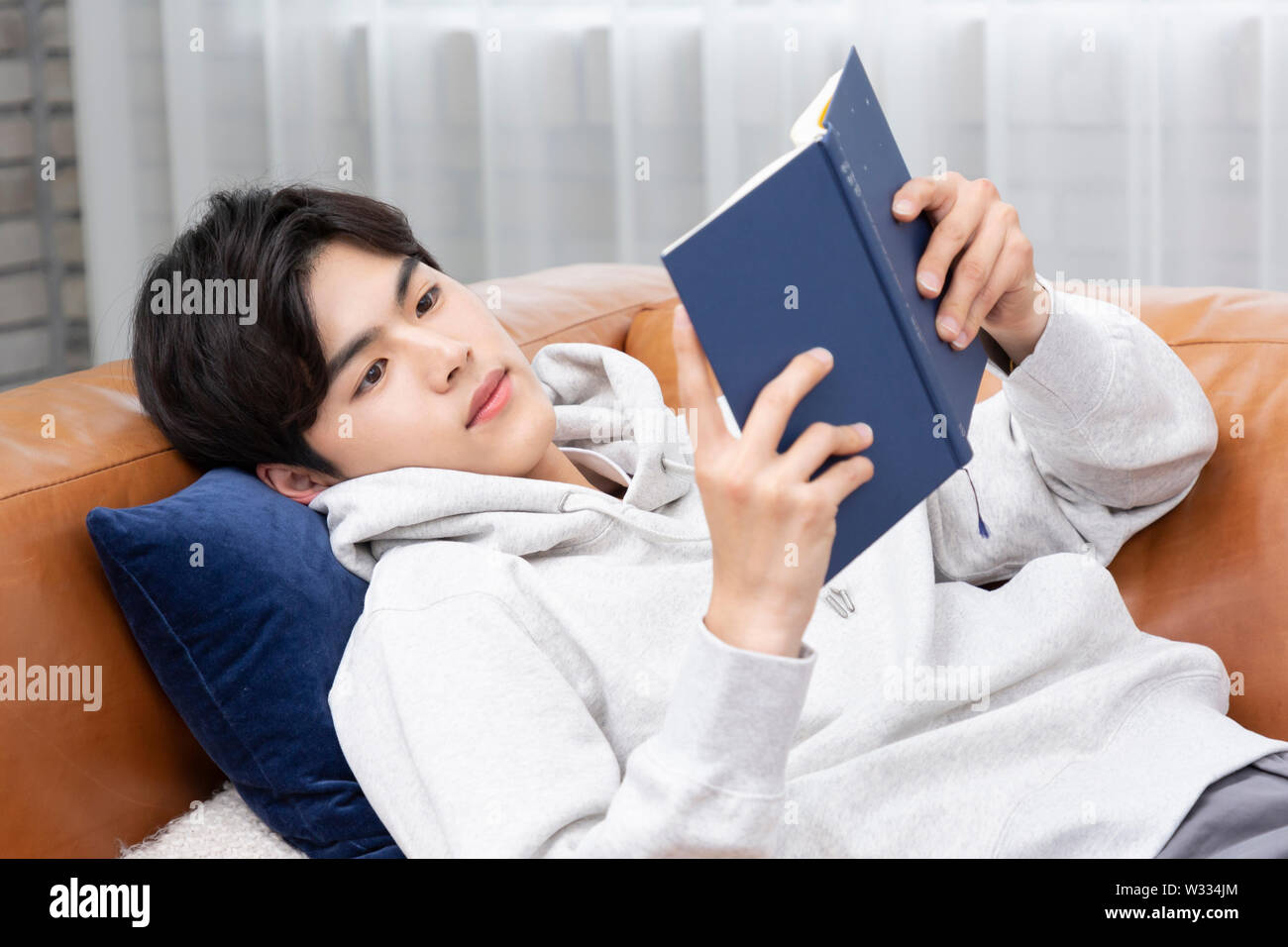 Daily routines Of an asian young man 014 Stock Photo - Alamy