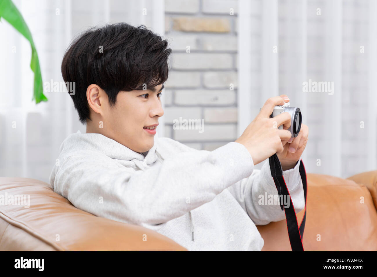 Daily routines Of an asian young man 008 Stock Photo - Alamy