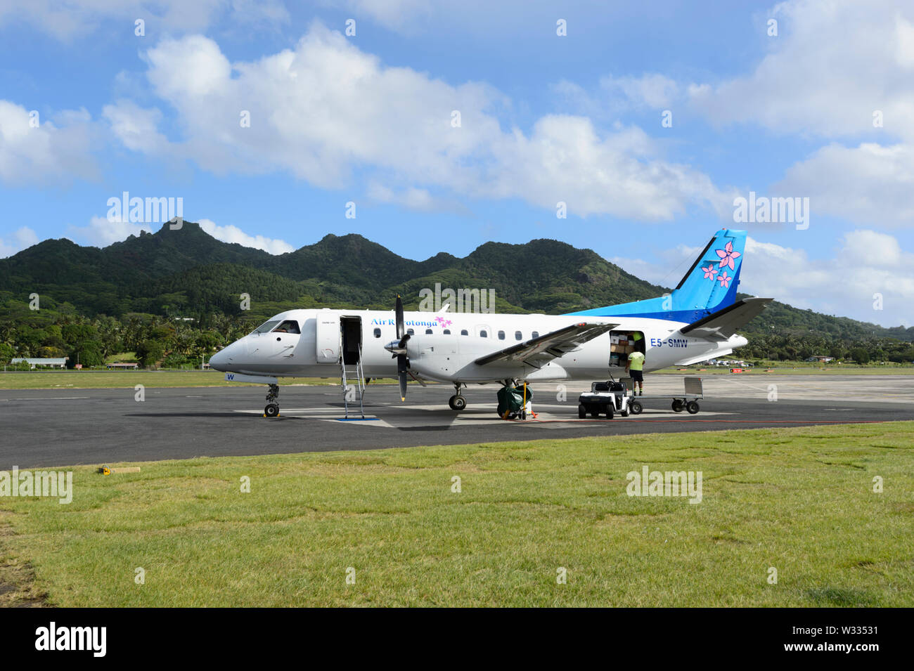 An Air Rarotonga SAAB 340 Aircraft being loaded with the luggage on the ...