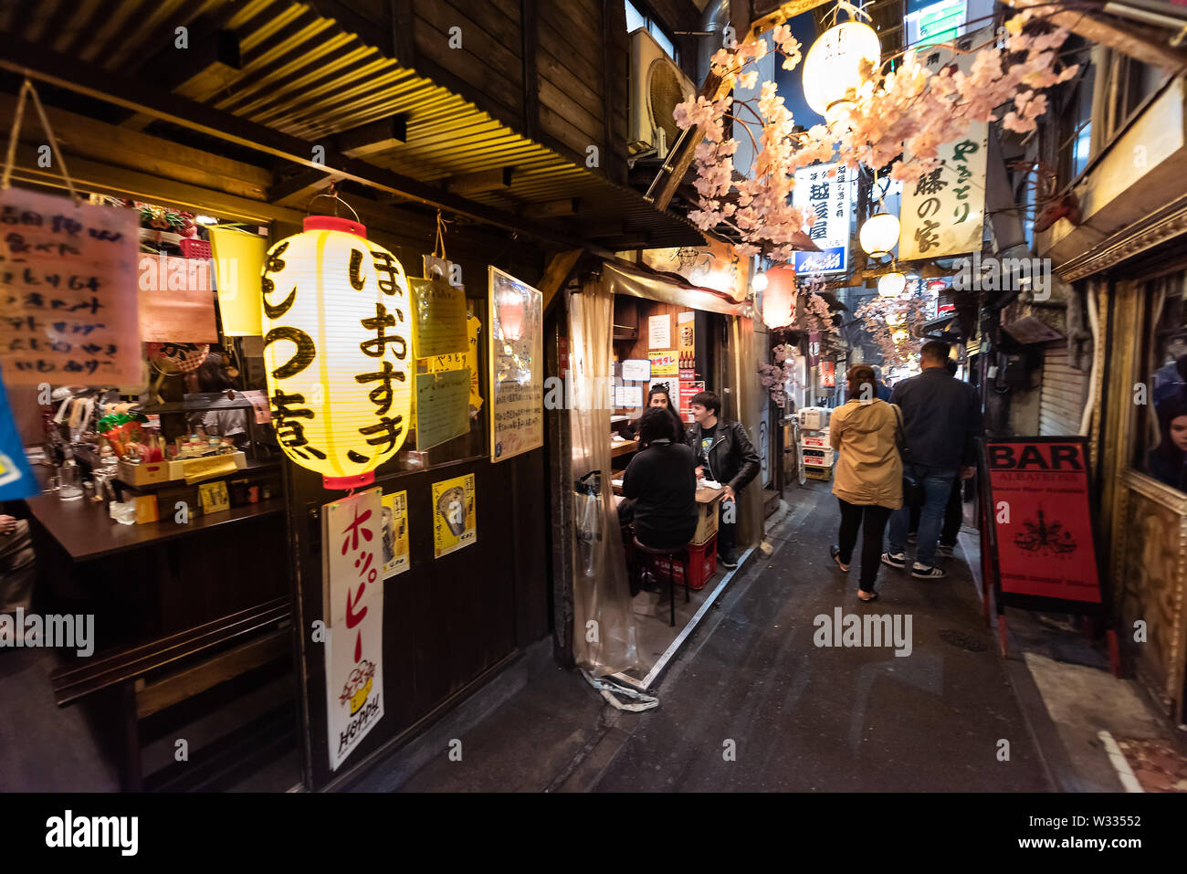 Shinjuku, Japan - April 4, 2019: Memory lane alley with izakaya pub ...