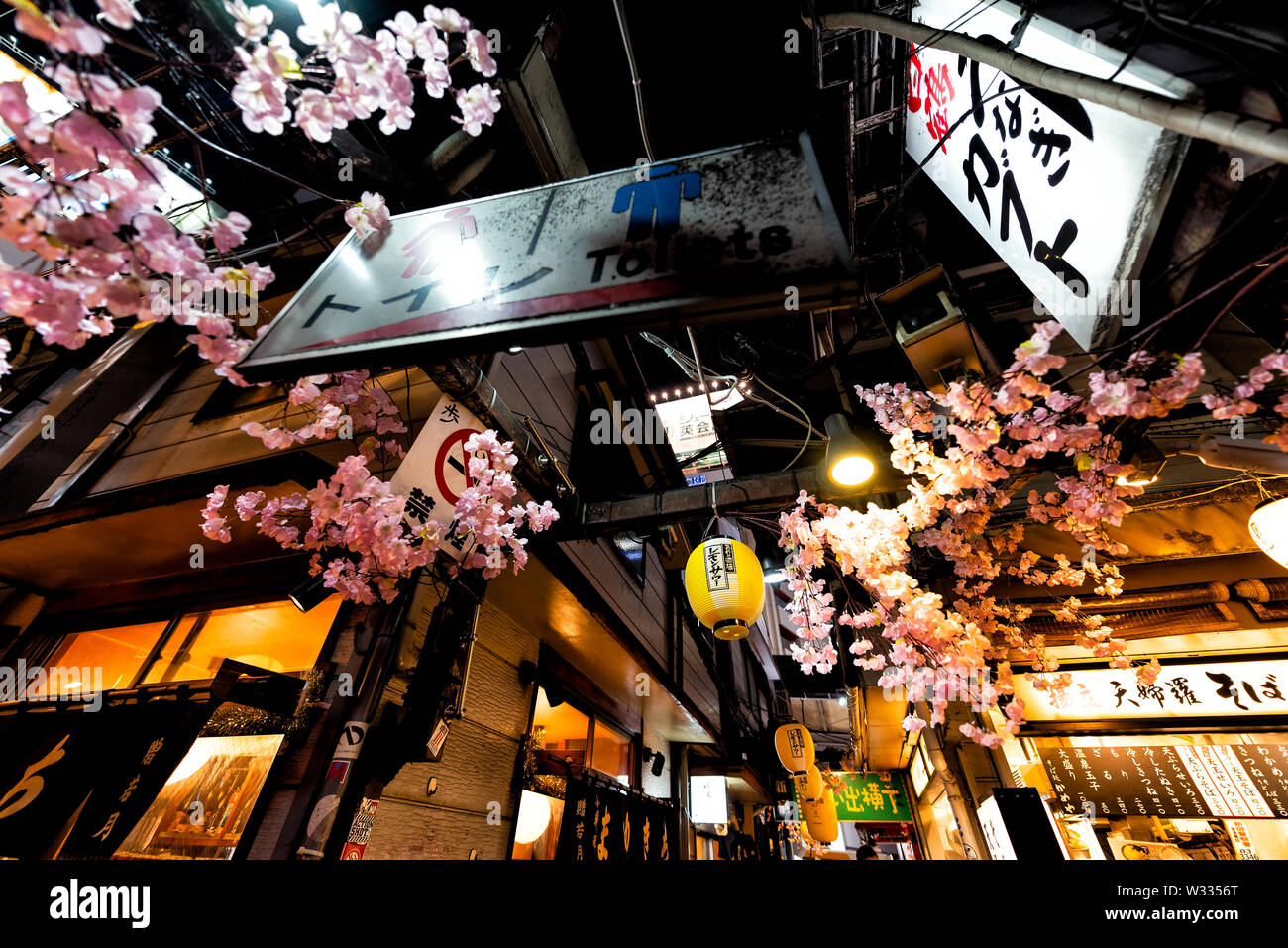 Shinjuku, Japan - April 4, 2019: Low angle view on Memory lane alley ...