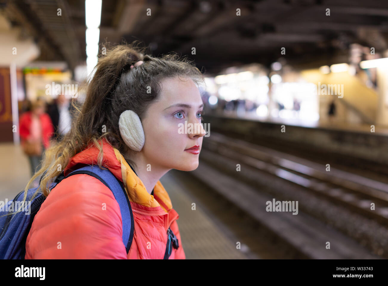 Young japanese woman waiting train hi-res stock photography and images ...