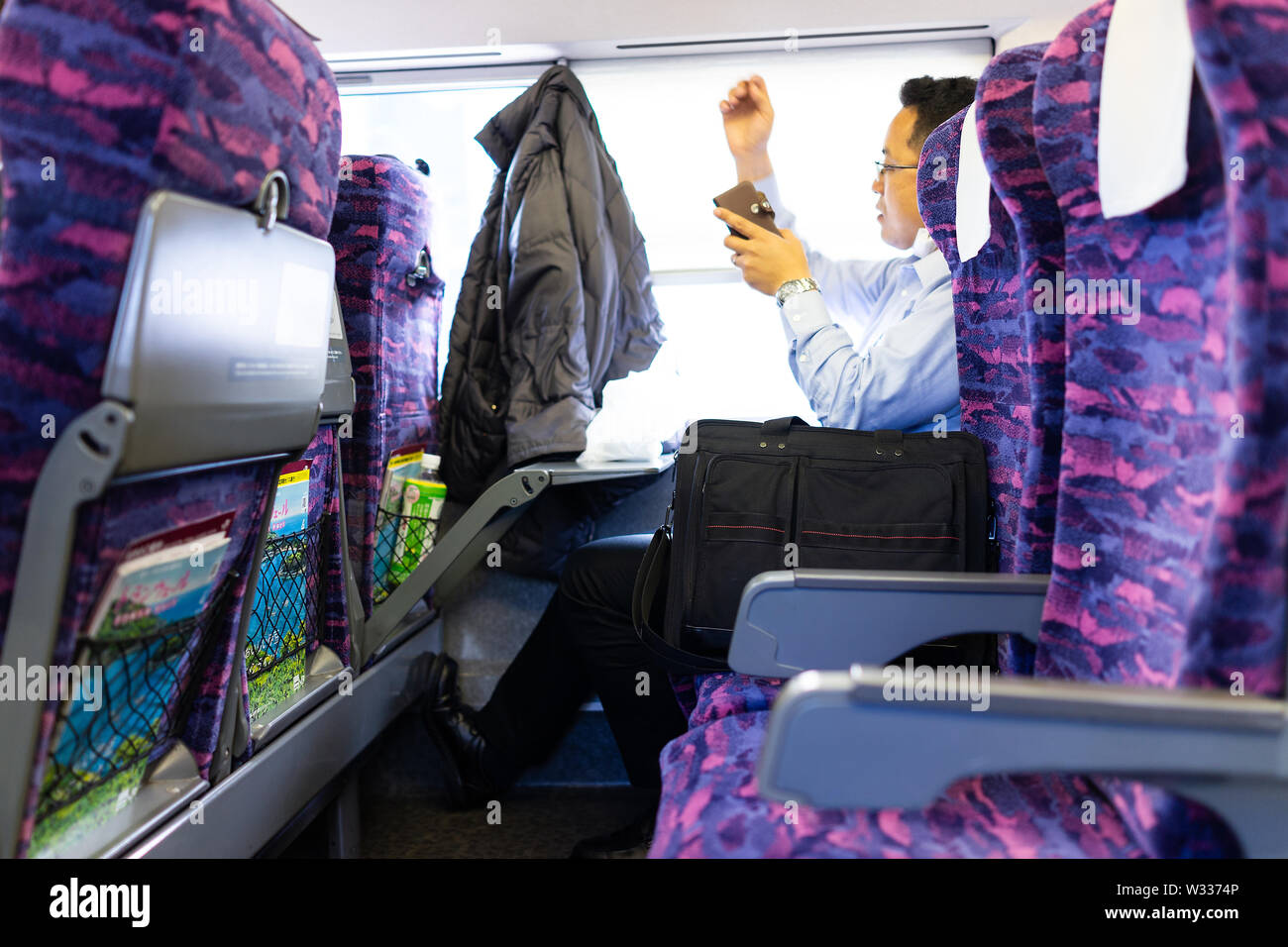 Tokyo, Japan - April 4, 2019: Inside of bullet train shinkansen car in ...