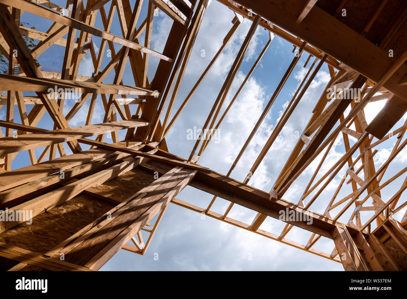 Framing beam of new house under construction home beam construction ...