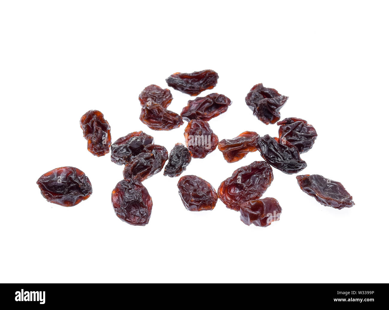Dried raisins isolated on white background Stock Photo - Alamy