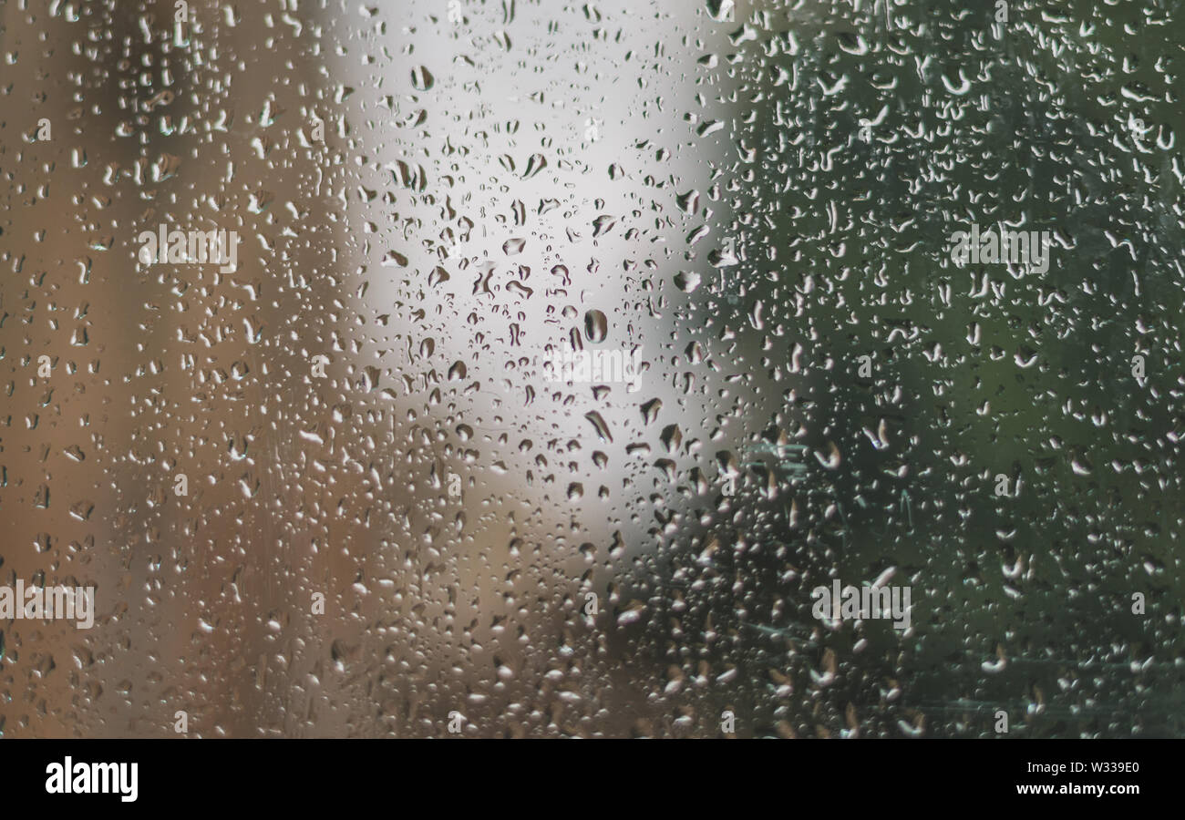 Rain drops on the window glass. Autumn and fall concept Stock Photo - Alamy