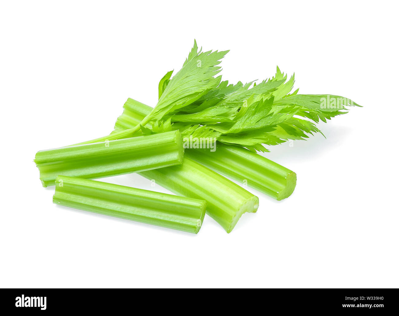 fresh celery on white background Stock Photo - Alamy