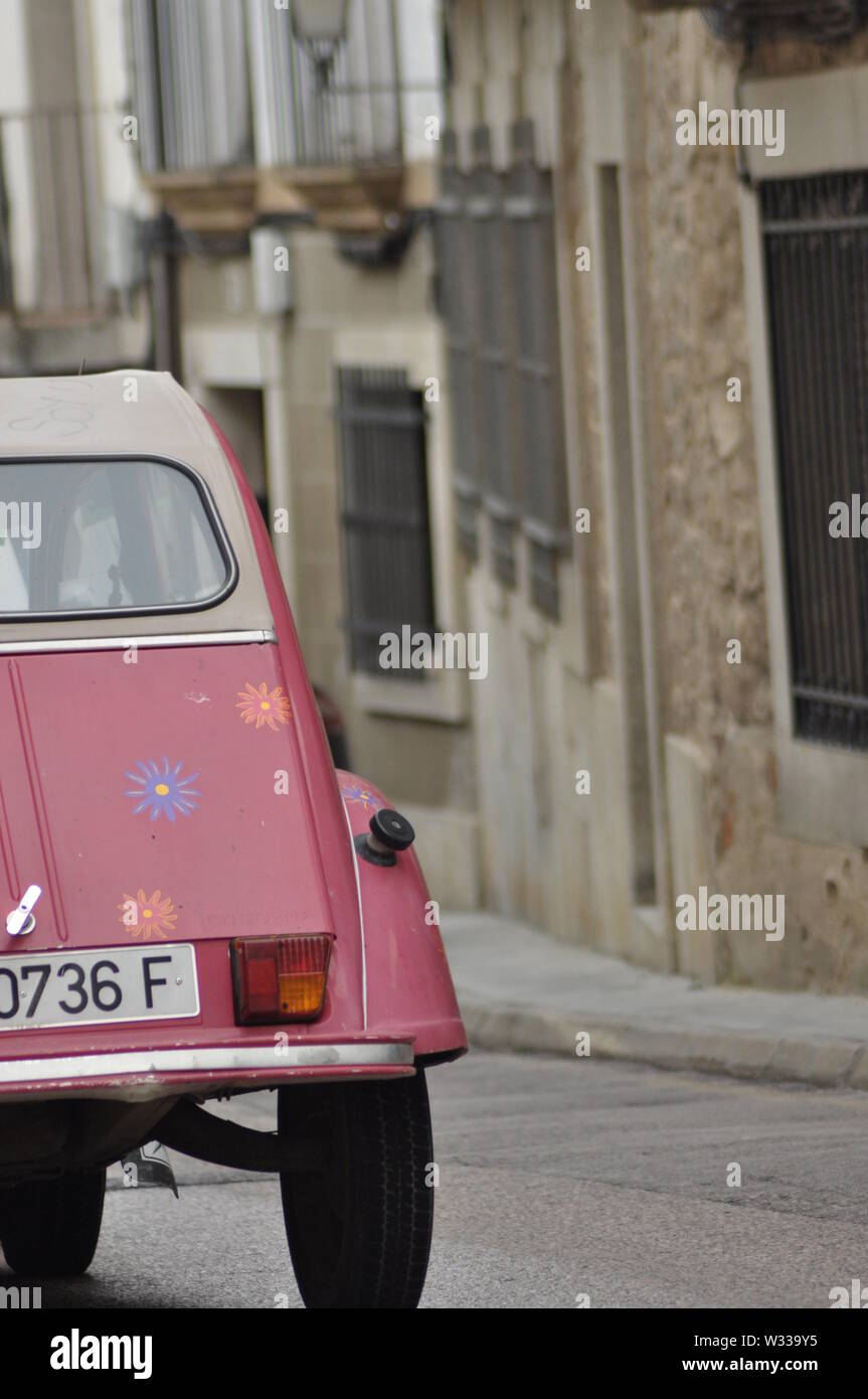 Car. Pink bump on the streets of a Spanish town Stock Photo - Alamy
