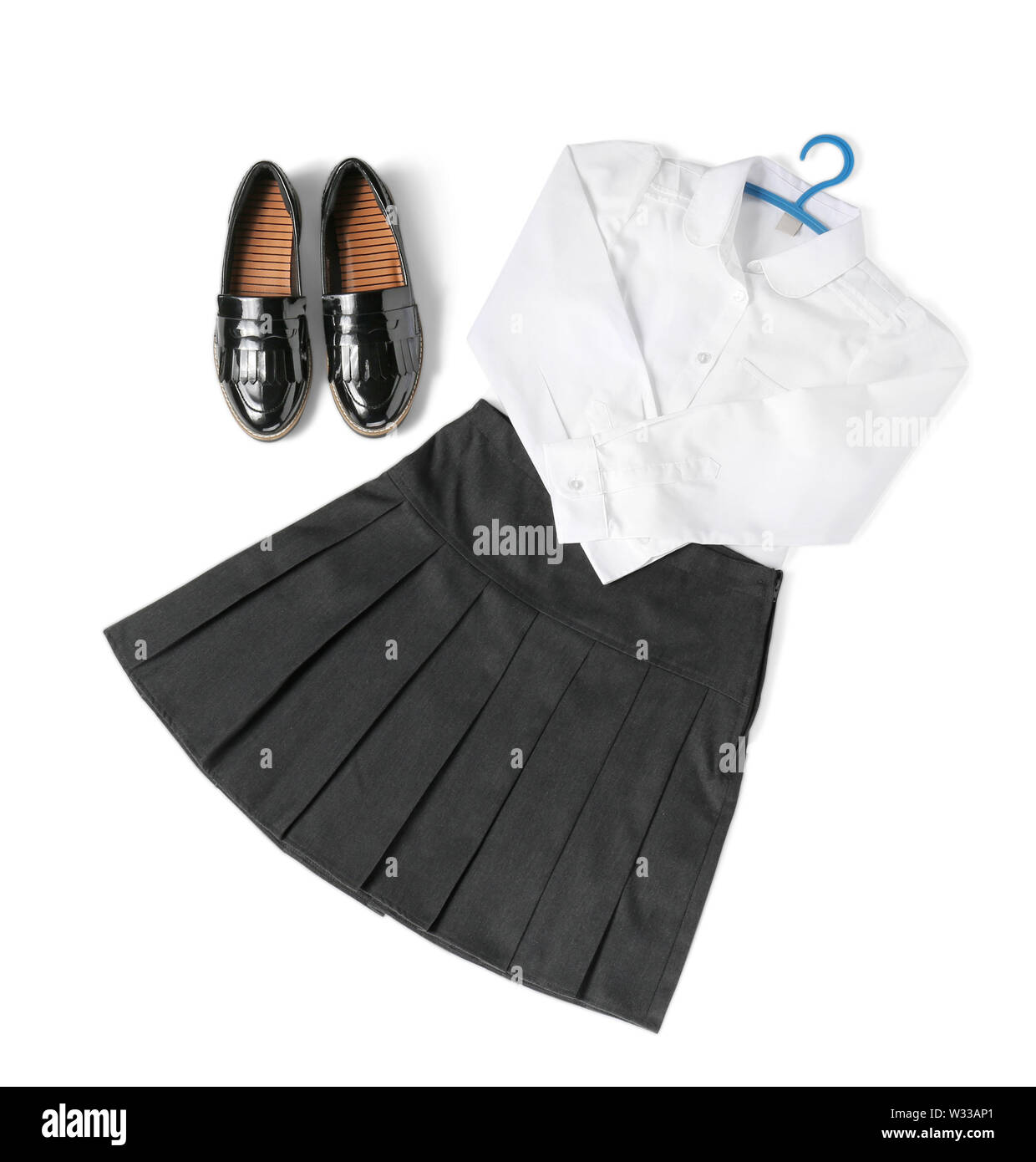 School uniform on white background Stock Photo - Alamy