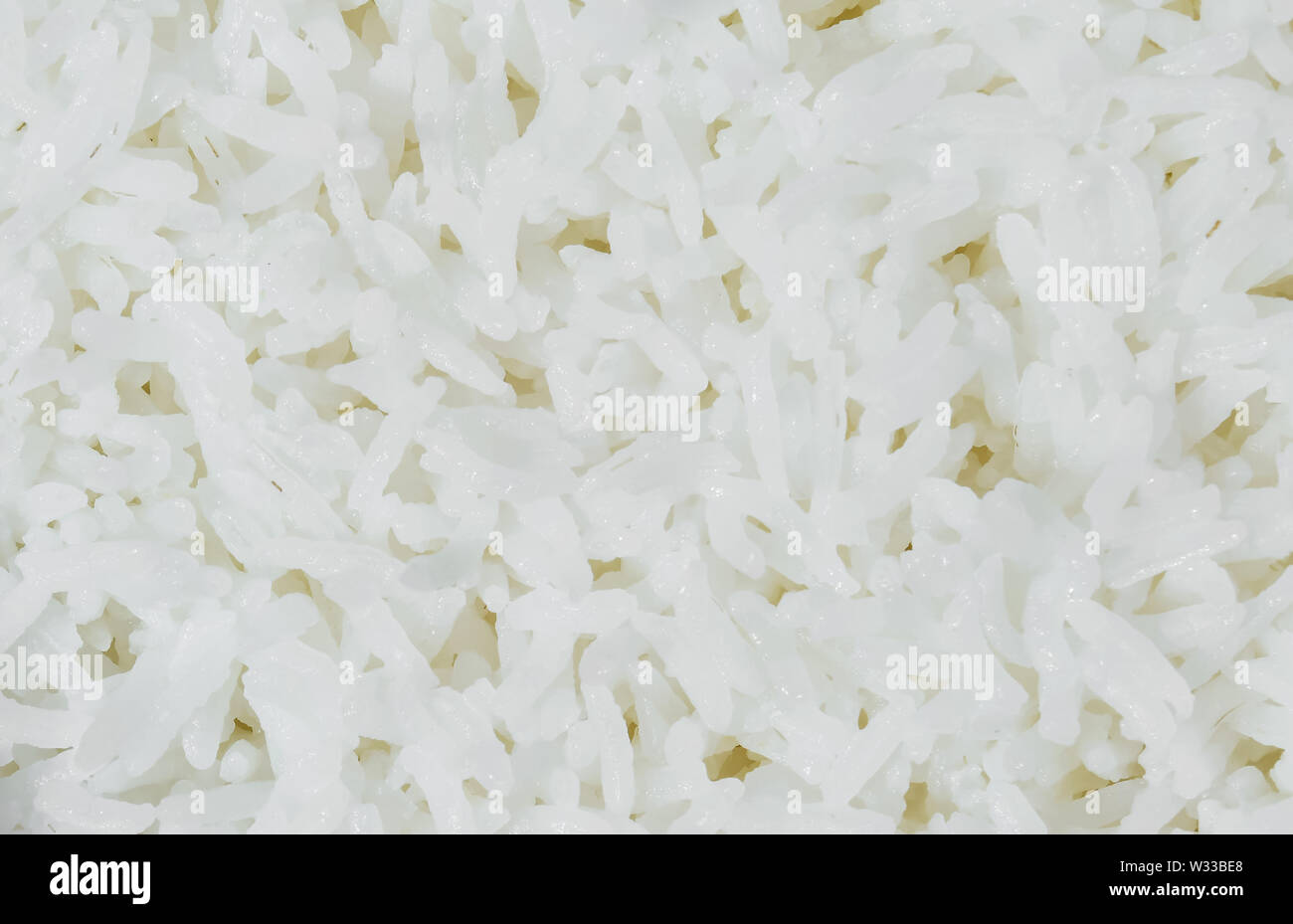 cooked rice on white background Stock Photo - Alamy