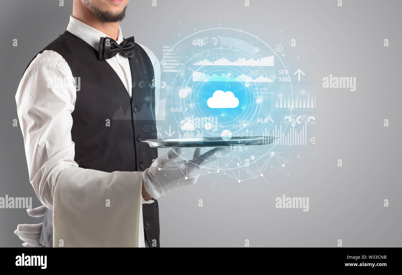 Elegant young waiter serving cloud technology concept Stock Photo - Alamy