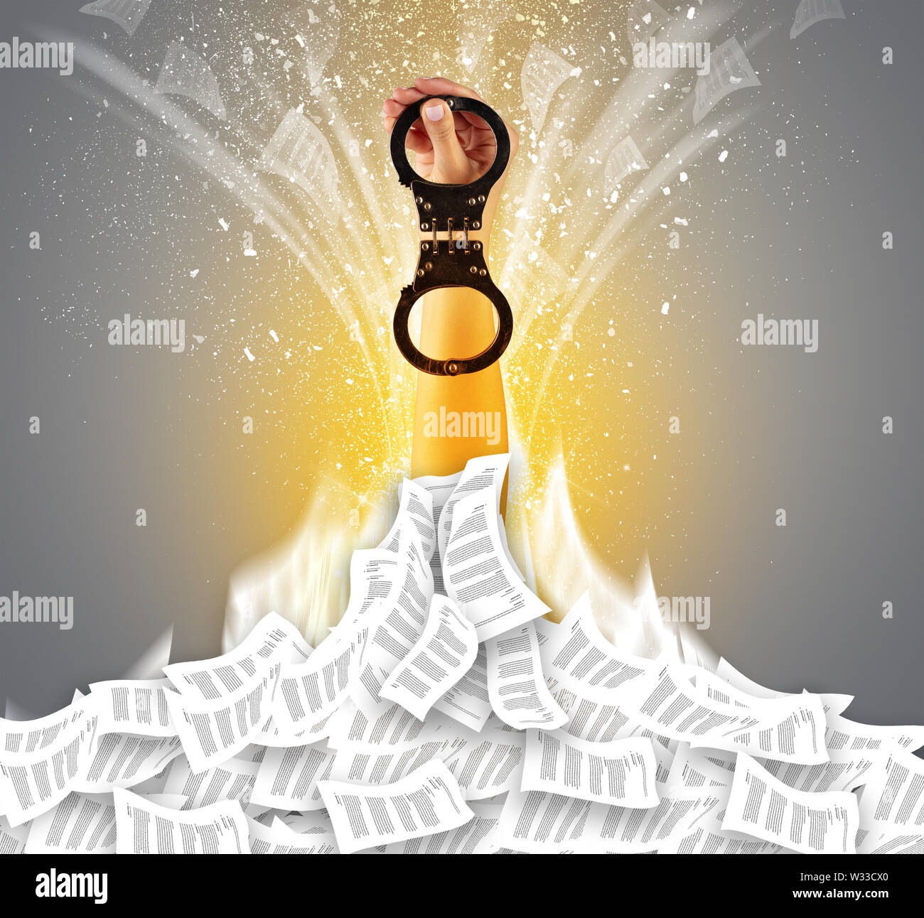 Hand buried in document pile and breaking out from it Stock Photo - Alamy