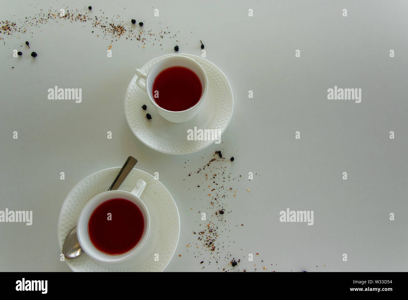 Top view of red fruits tea glasses. Drinks flat lay. Refreshment break ...