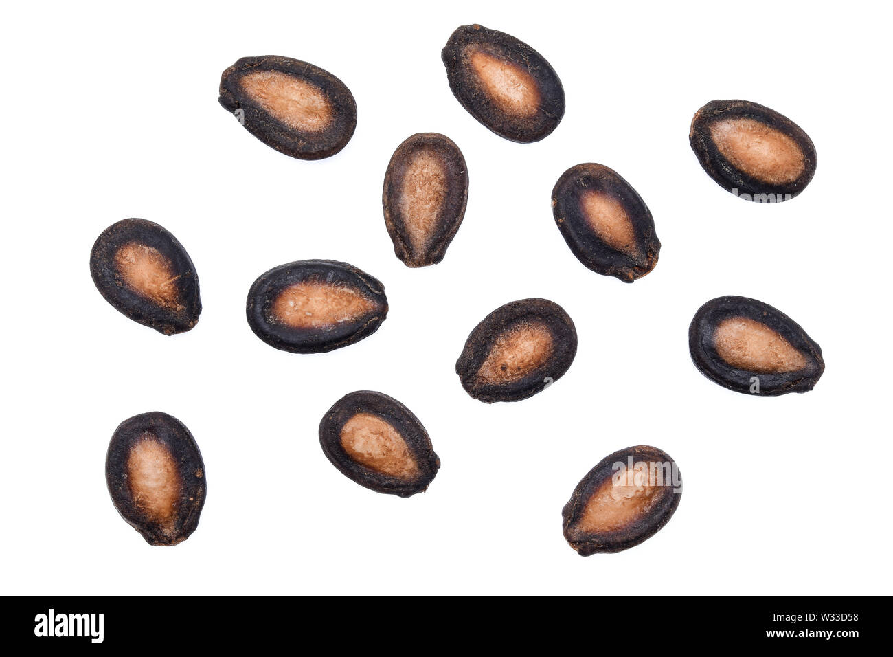 Top view of watermelon seeds on white background Stock Photo - Alamy