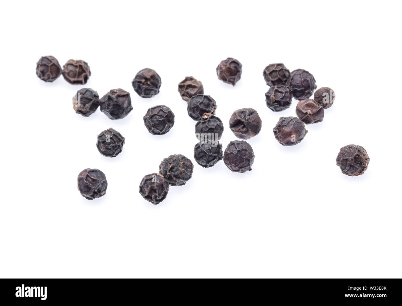 pepper corn on white background Stock Photo - Alamy