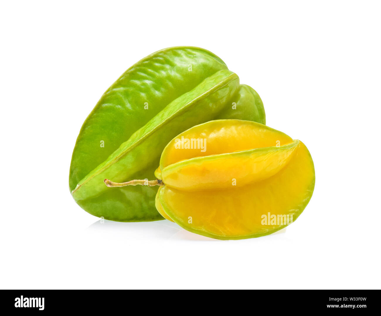 Star apple on white background Stock Photo - Alamy