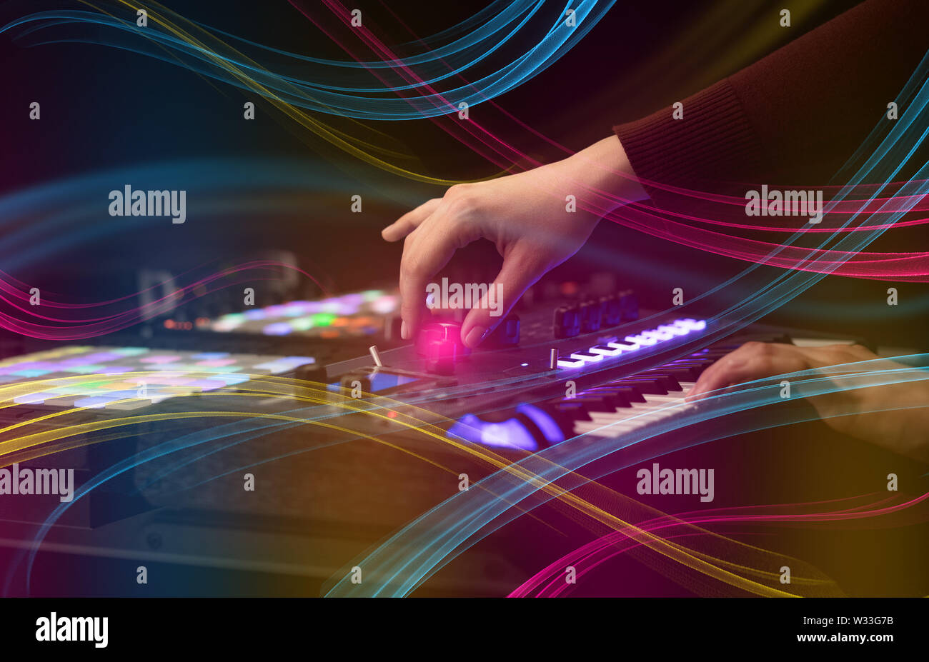 Hand mixing music on midi controller with colorful vibe concept Stock ...