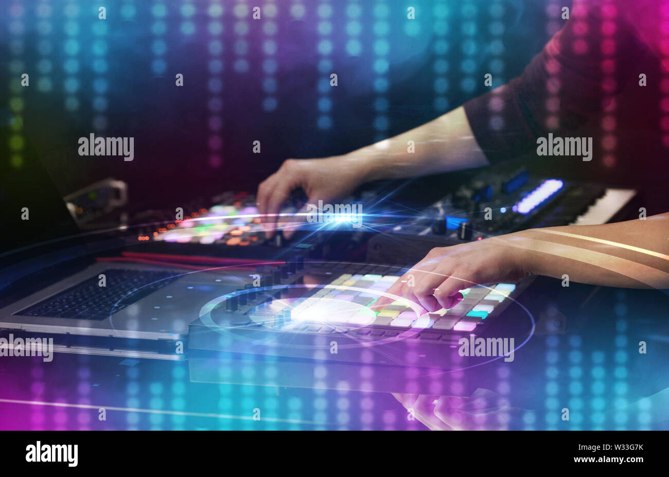 Hand mixing music on dj controller with social media concept icons ...