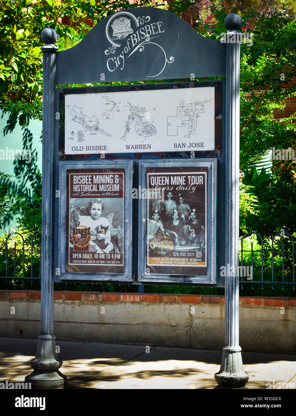 A"City of Bisbee" sponsored signboard with maps and photo posters ...