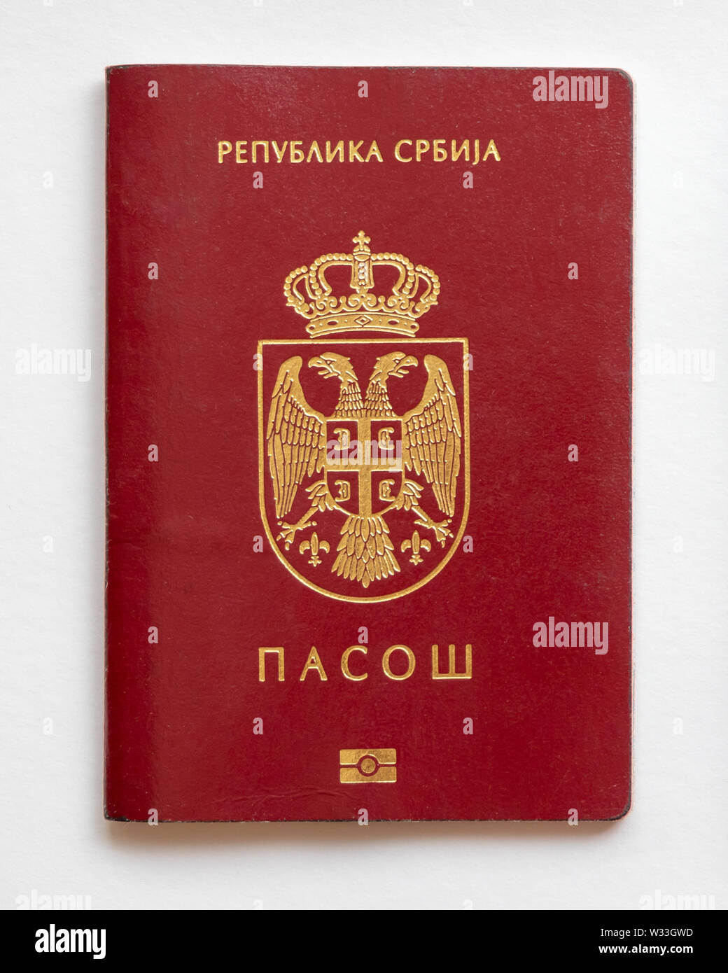 Serbian passport isolated on white paper background Stock Photo - Alamy