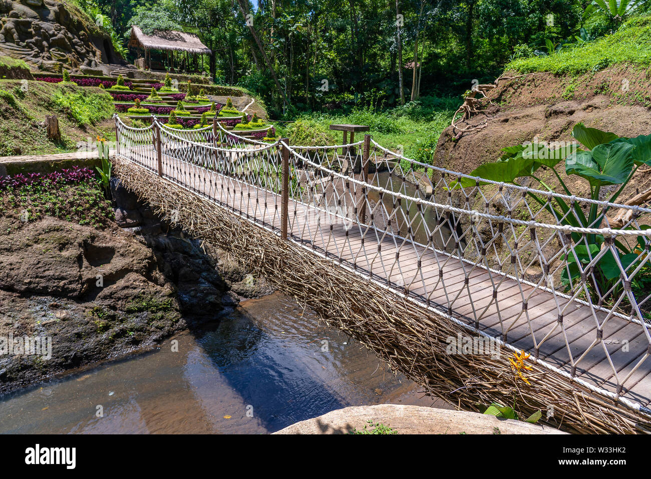 Suspension bridge in the jungle near the rice terraces in island Bali ...
