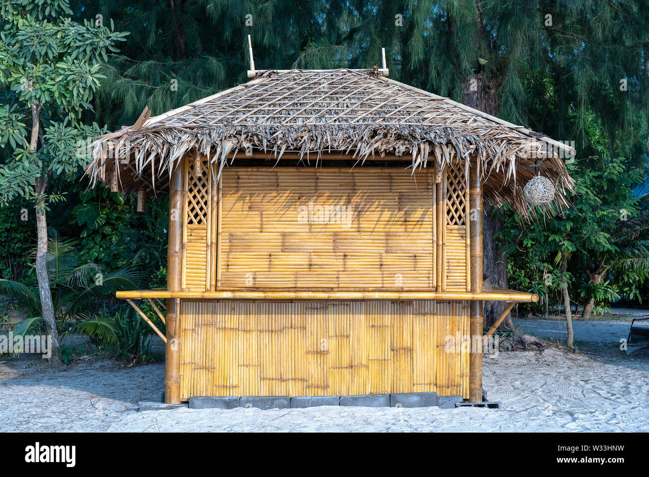 Bamboo hut on the tropical sand beach in island Koh Phangan, Thailand, close up Stock Photo - Alamy