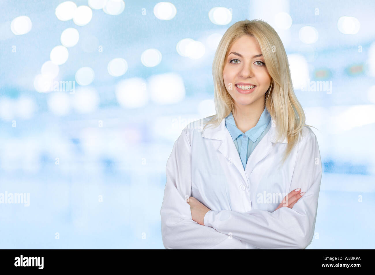 Woman doctor standing Stock Photo - Alamy