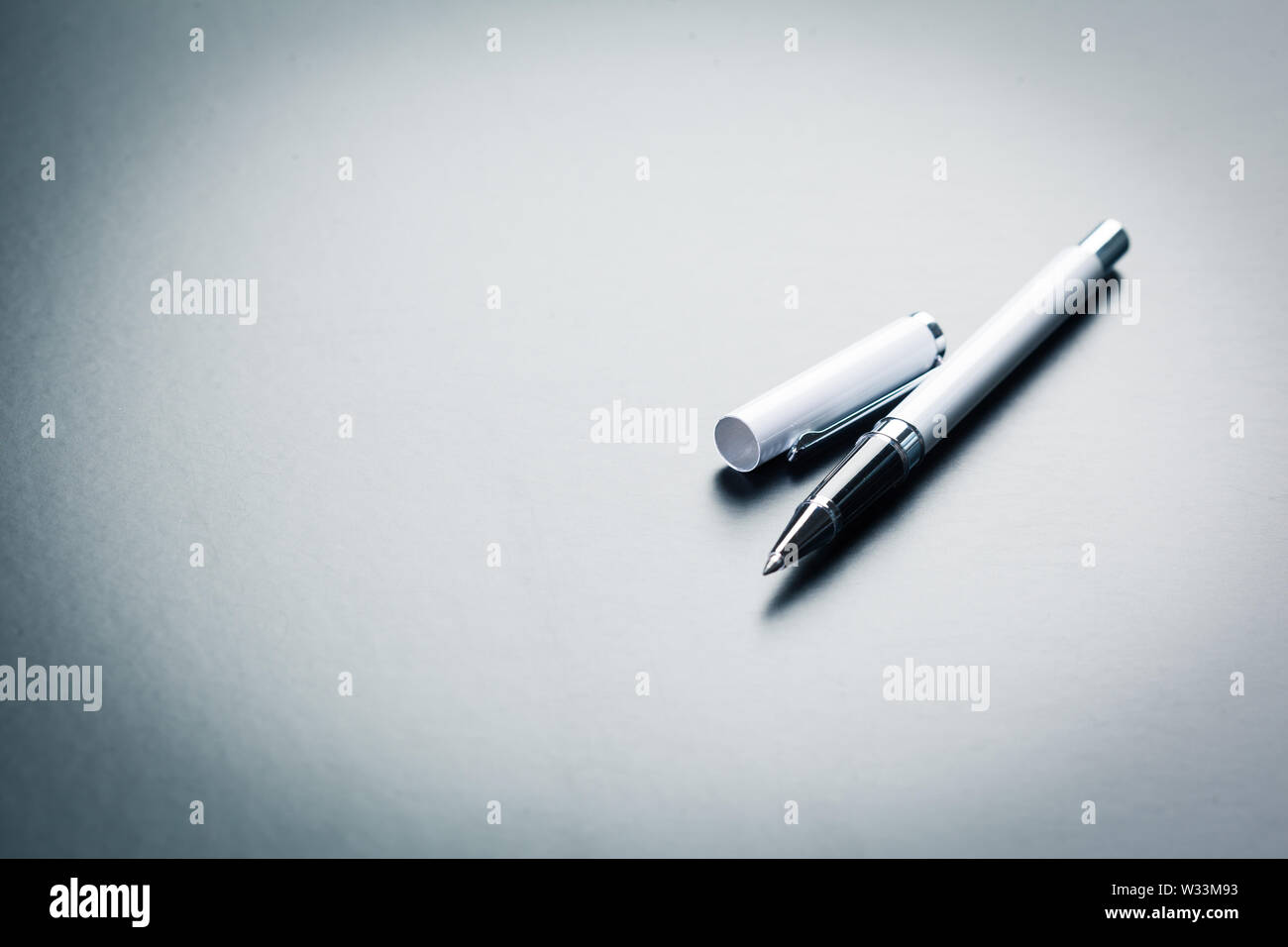 Office desk table with pen Stock Photo - Alamy
