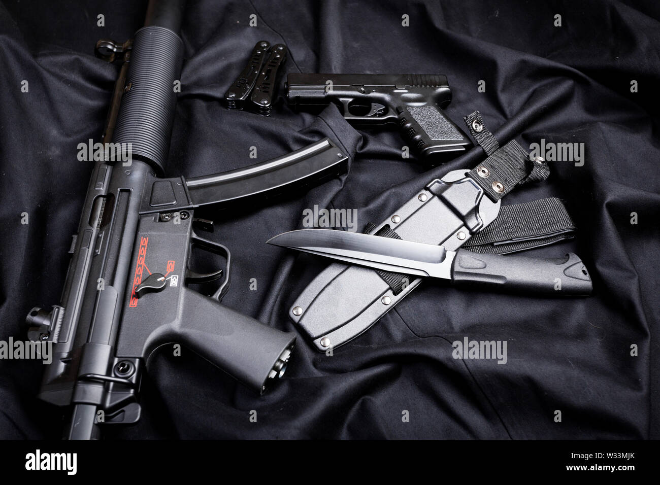 modern weapon, black background Stock Photo - Alamy