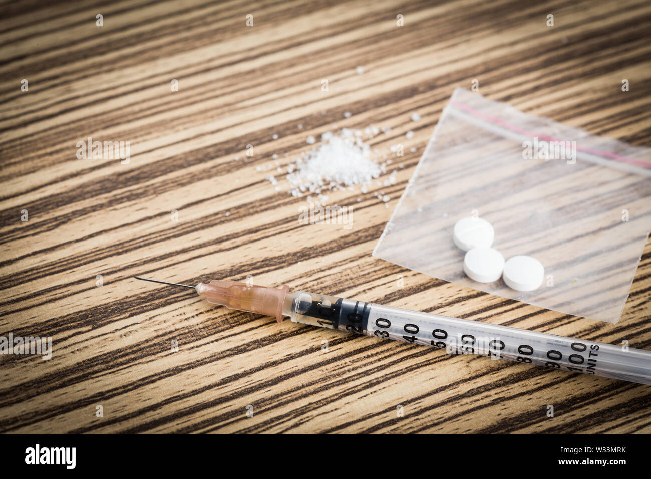 Drug syringe and cooked heroin Stock Photo - Alamy