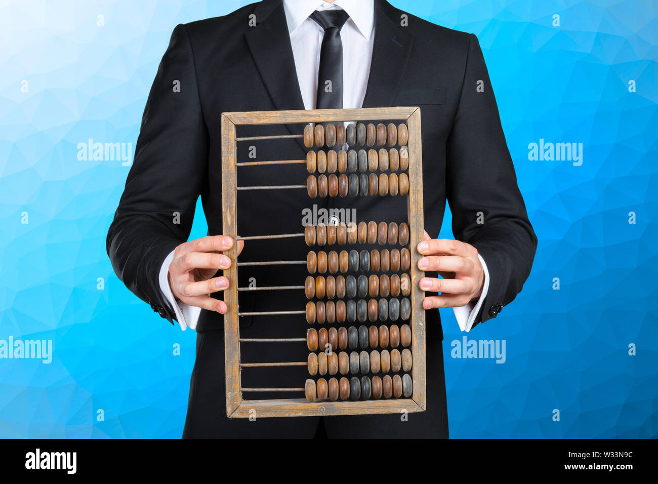 Businessman with abacus Stock Photo - Alamy
