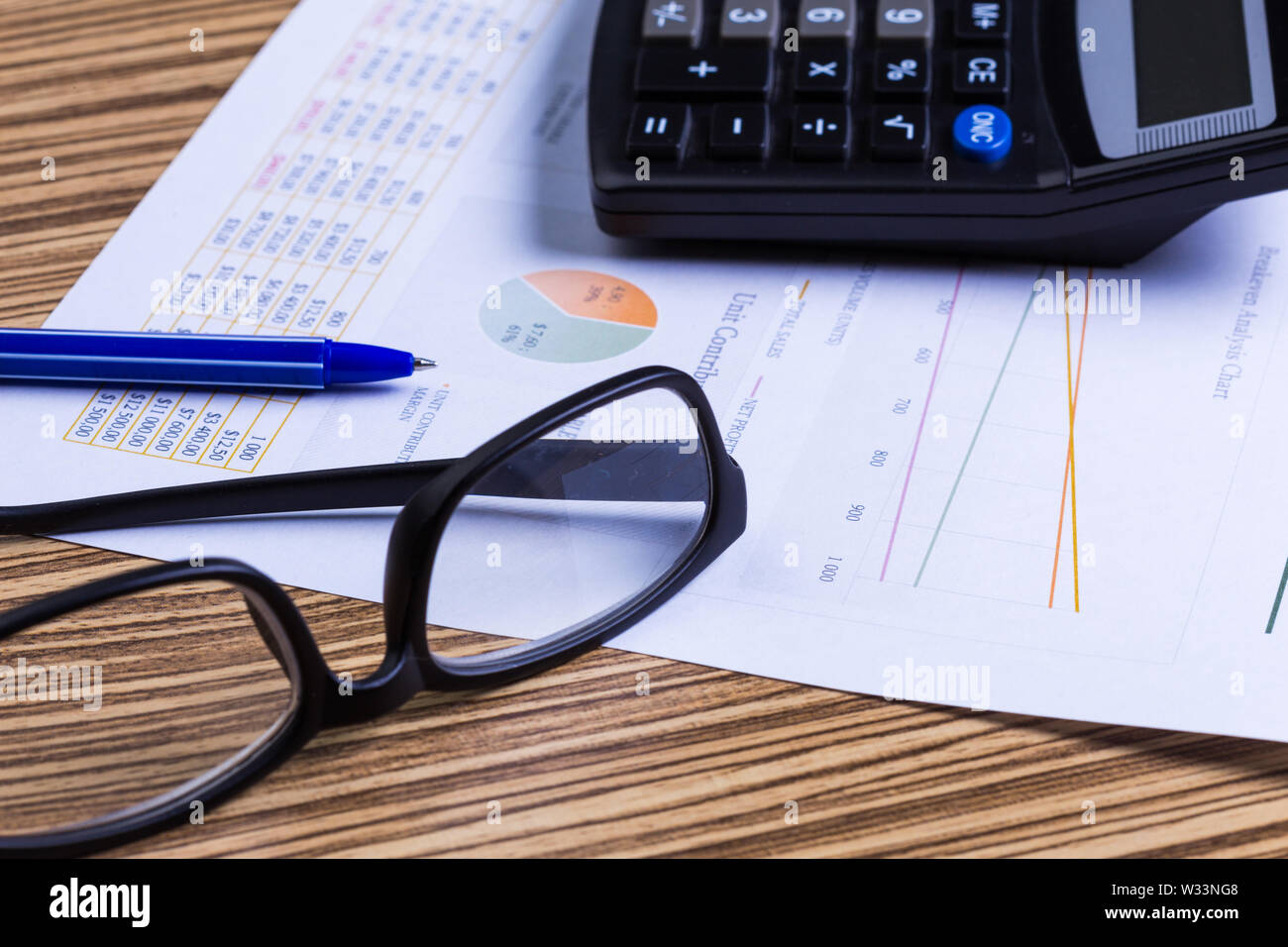 Graphs and Calculator Stock Photo - Alamy