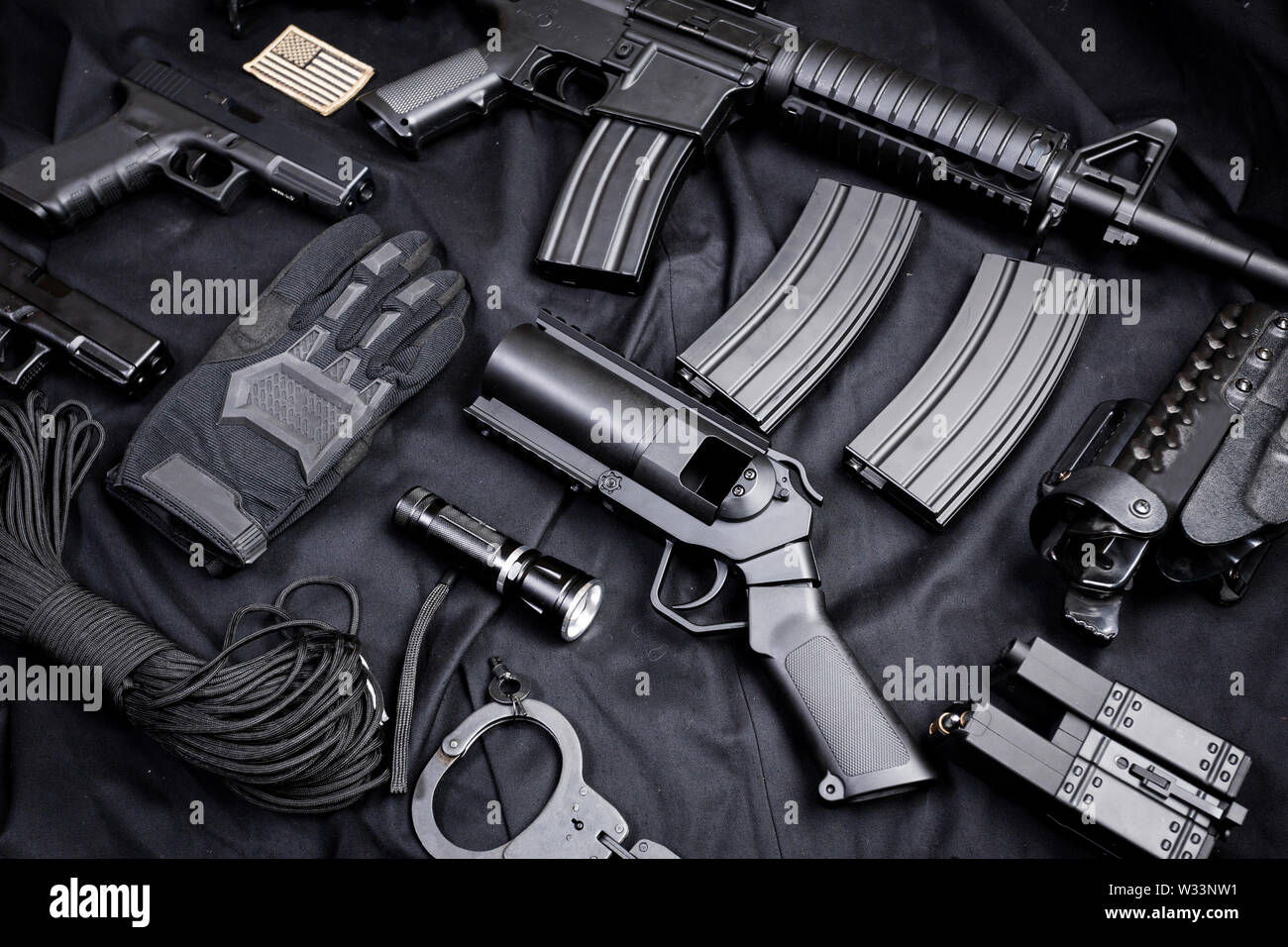 modern weapon, black background Stock Photo - Alamy