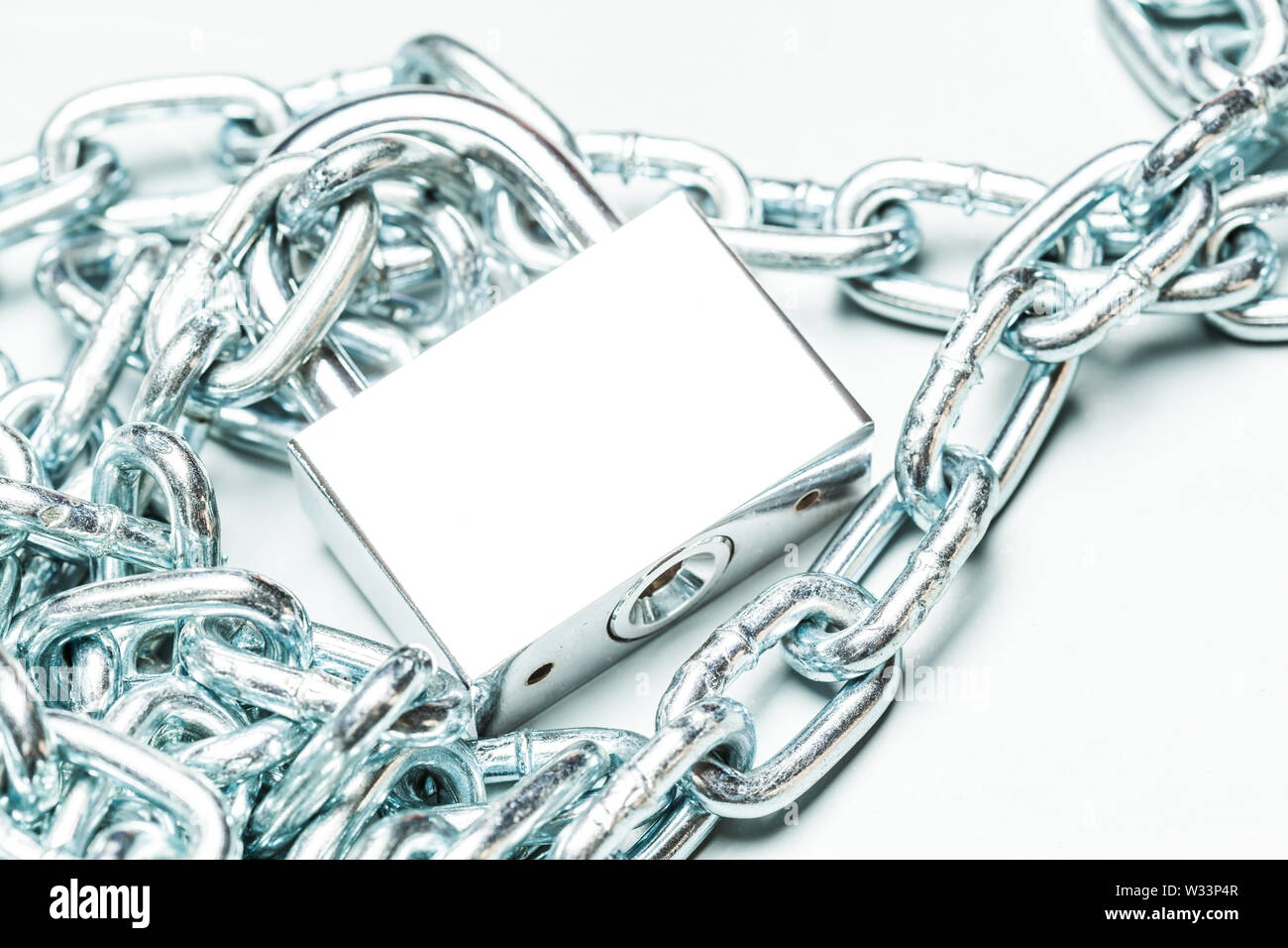 The padlock and chains isolated Stock Photo - Alamy