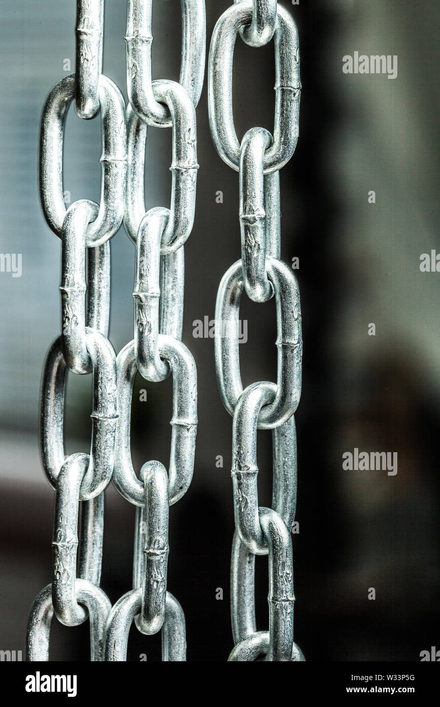 Strong chain black background Stock Photo - Alamy