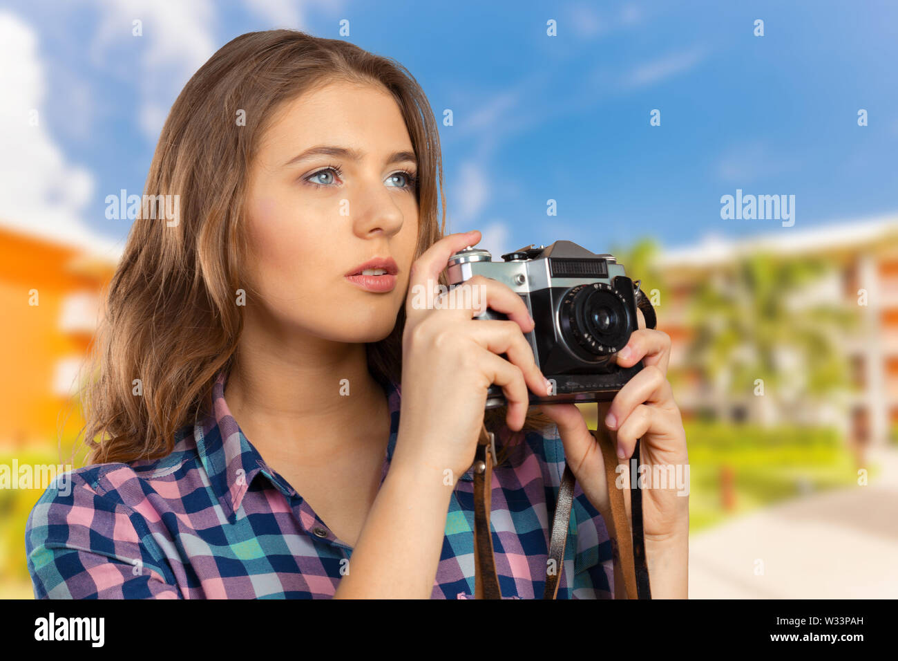 Woman photographer with camera Stock Photo - Alamy
