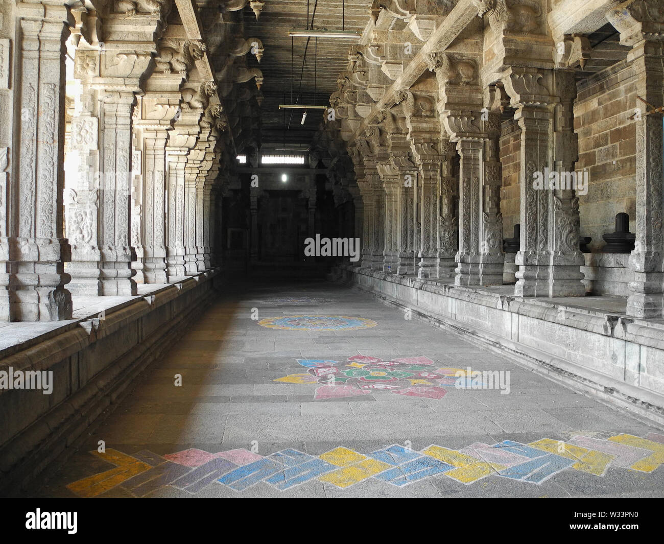 Ancient Indian temple with carved stone columns, Tamil Nadu ...