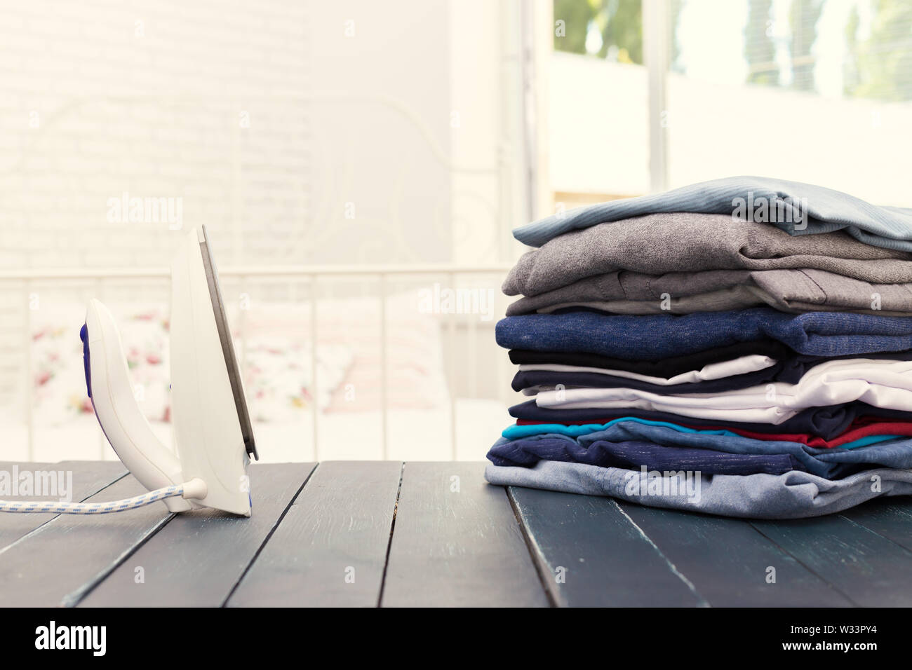 Stack of clothes Stock Photo - Alamy