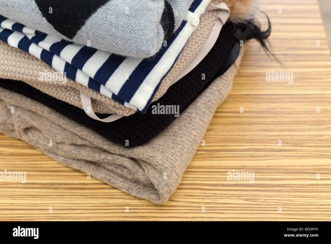 Stack of clothes Stock Photo - Alamy