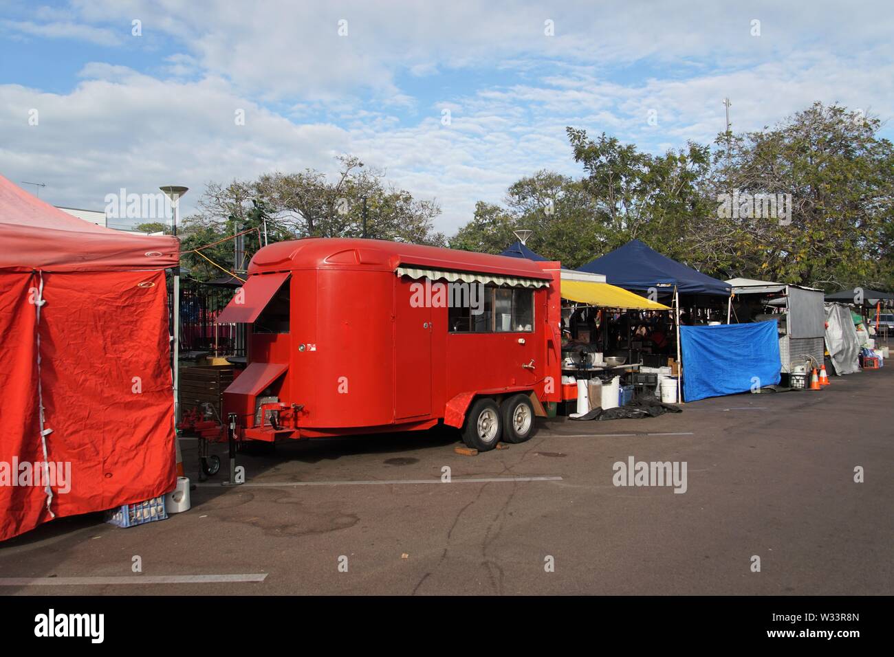 Bright Red Food Trailer standing out from the Crowd at a Local Market ...