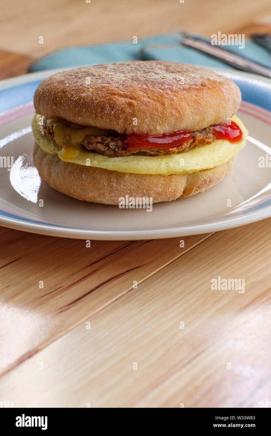 Sausage egg and cheese breakfast sandwich on and English muffin Stock ...