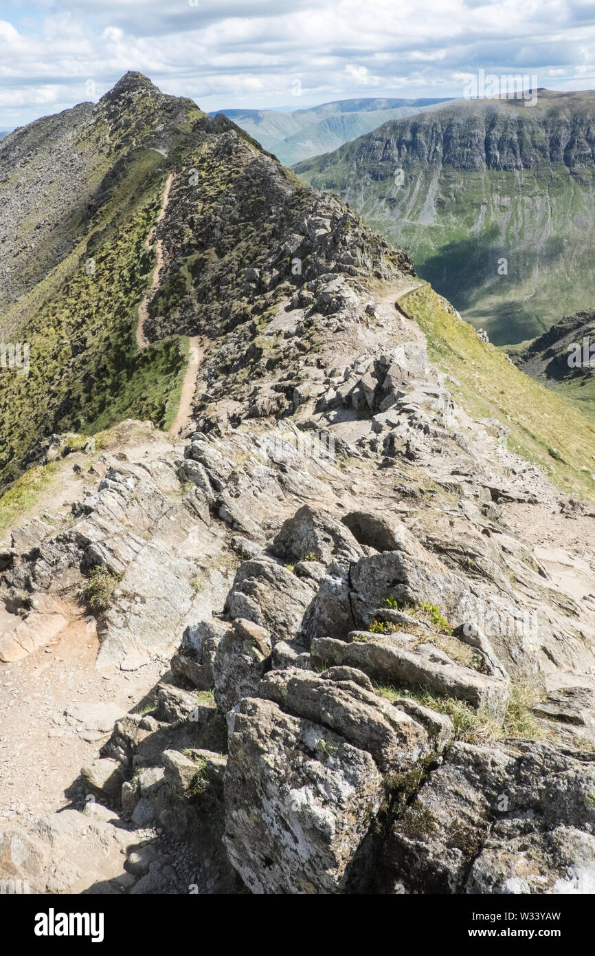 Helvellyn striding edge hiker hi-res stock photography and images - Alamy