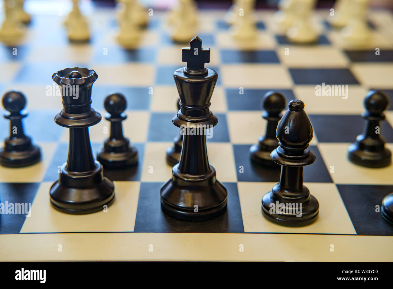 Chess pieces and board set up for beginning of game Stock Photo - Alamy